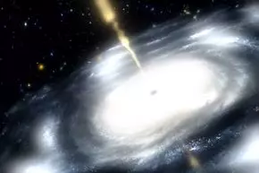 איור זה מציג גלקסיה עם חור שחור סופר מסיבי בליבה. (החור השחור גם יורה גלי רדיו.)